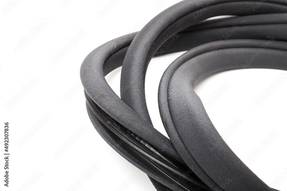 Foto Stock Rolled up black rubber sealant for elements of the car body ...