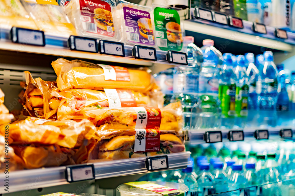 Pre-packaged foods displayed in a commercial refrigerator Stock Photo ...