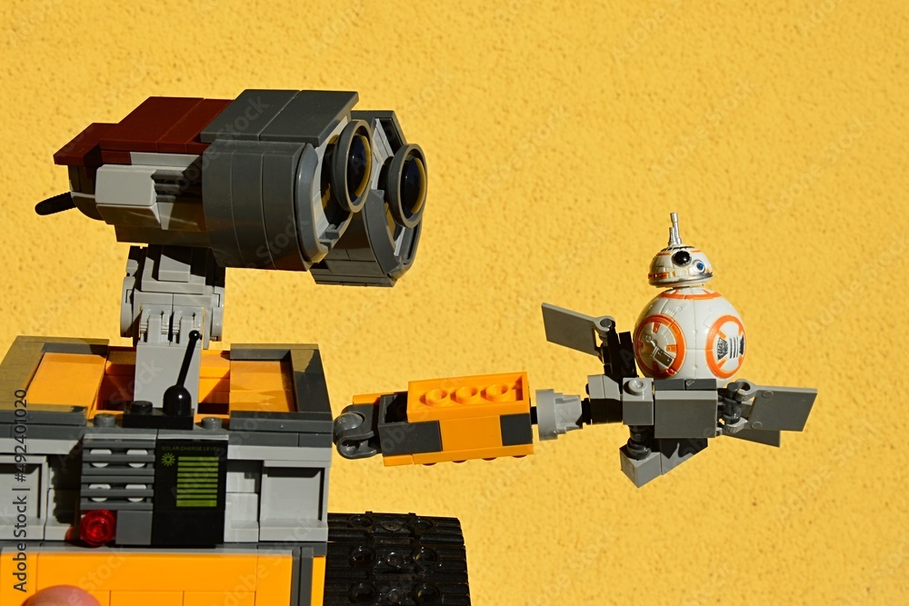 LEGO Wall-E robot from Disney Pixar movie holding small model of Star ...