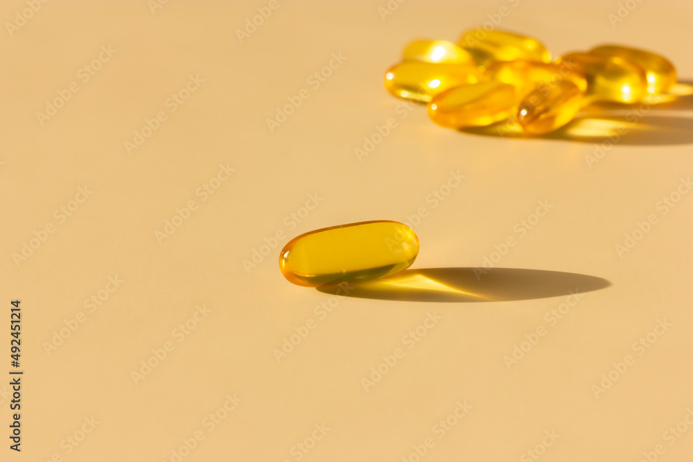 Omega fatty acids, capsules with food and plan oil. Concept: healthy ...