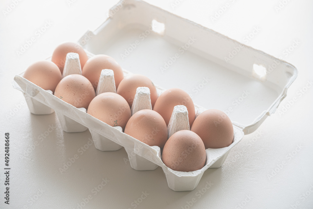 eggs in a egg carton Stock Photo | Adobe Stock