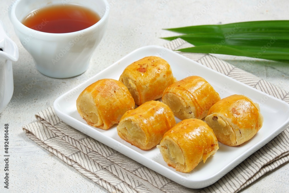 Bolen pisang or banana bolen is a snack made from bananas wrapped in ...