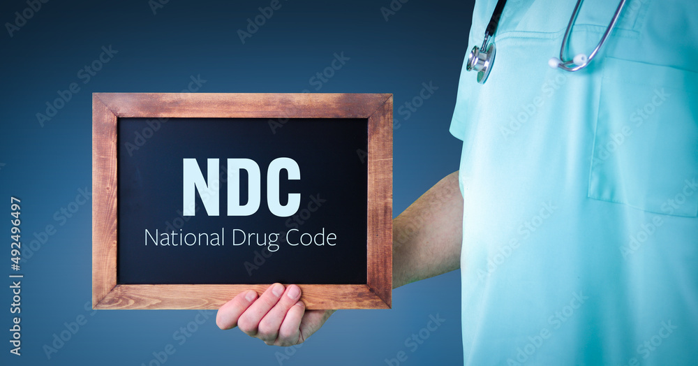 NDC (National Drug Code). Doctor shows sign/board with wooden frame. Background blue Stock-Foto ...