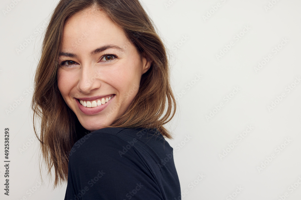 Beautiful Portrait Of Young Happy Woman With A Big Smile On Her Face