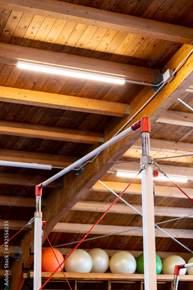 Uneven bars female gymnastic sport equipment background empty gym no ...