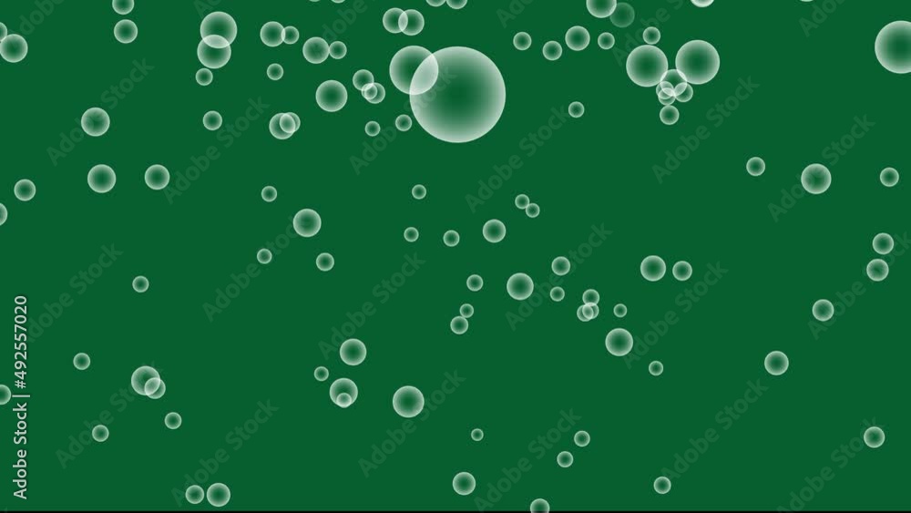 Green background with falling white bubbles. Simple high definition ...
