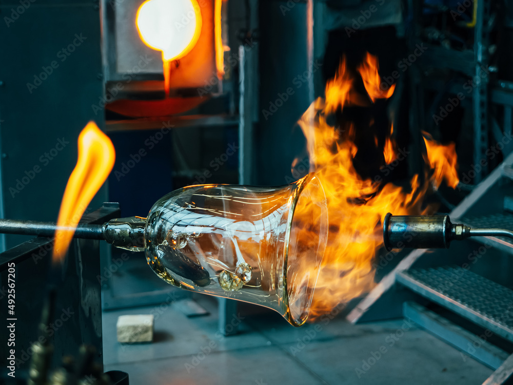 Manual glass processing by the craftsmen inside a glass factory Photos ...