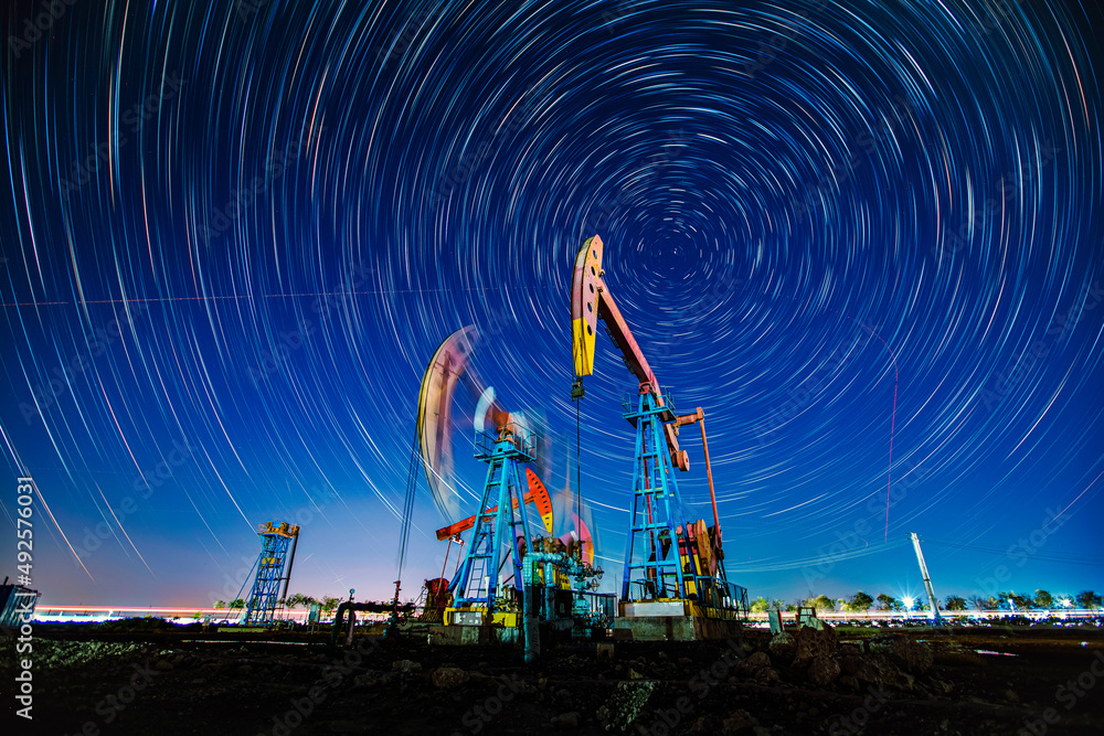 Photo & Art Print the oil pump and the trajectory of stars, Beam ...