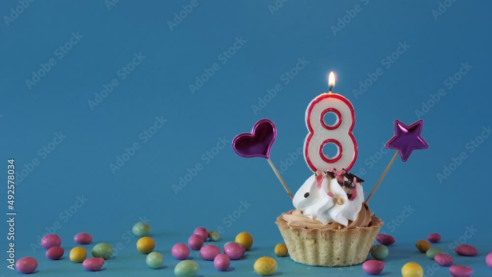 Happy birthday greetings to an 8 year old child, birthday cupcake with ...
