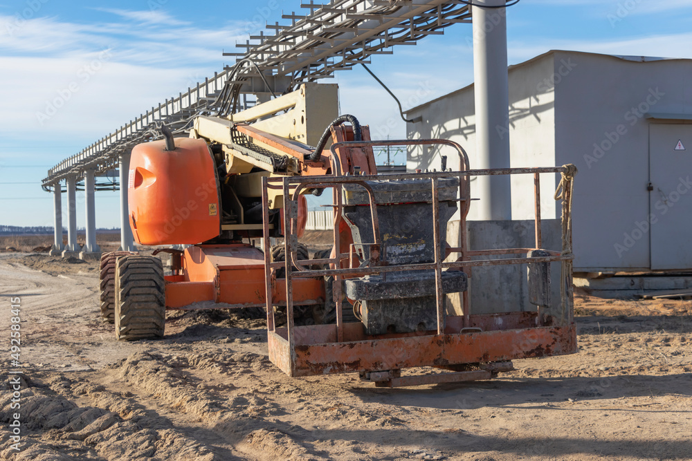 Building structures at height using a platform for lifting workers ...