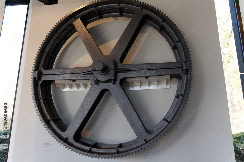 Former cog wheel driving wheel of public transportation railway named ...