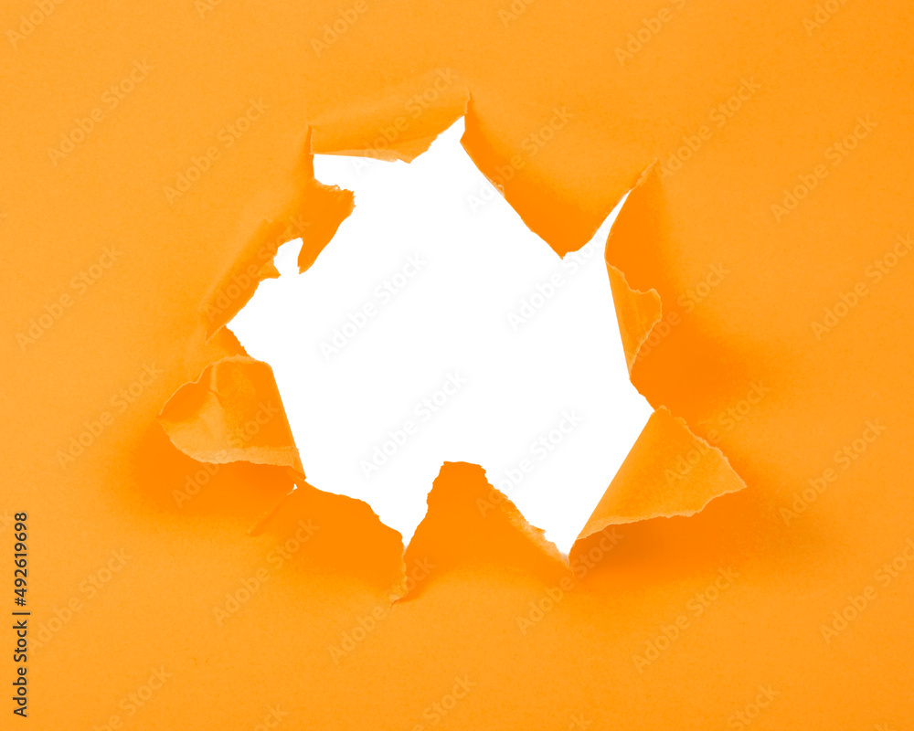 Orange crushed torn paper with hole copyspace background for idea Stock ...