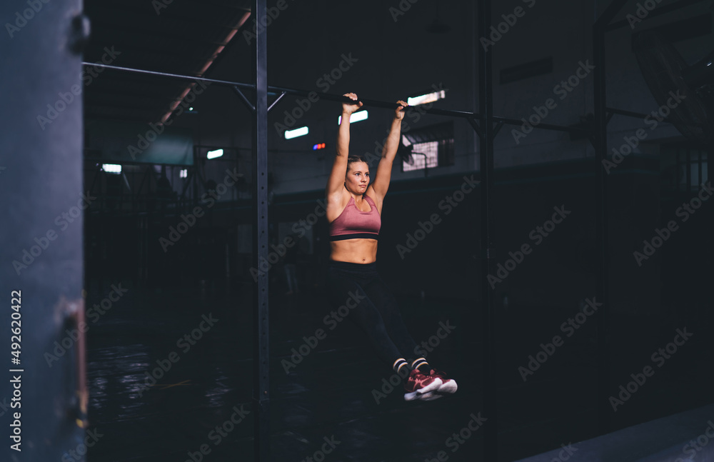 Strong athlete have hard morning workout in sportive cardio gym with ...