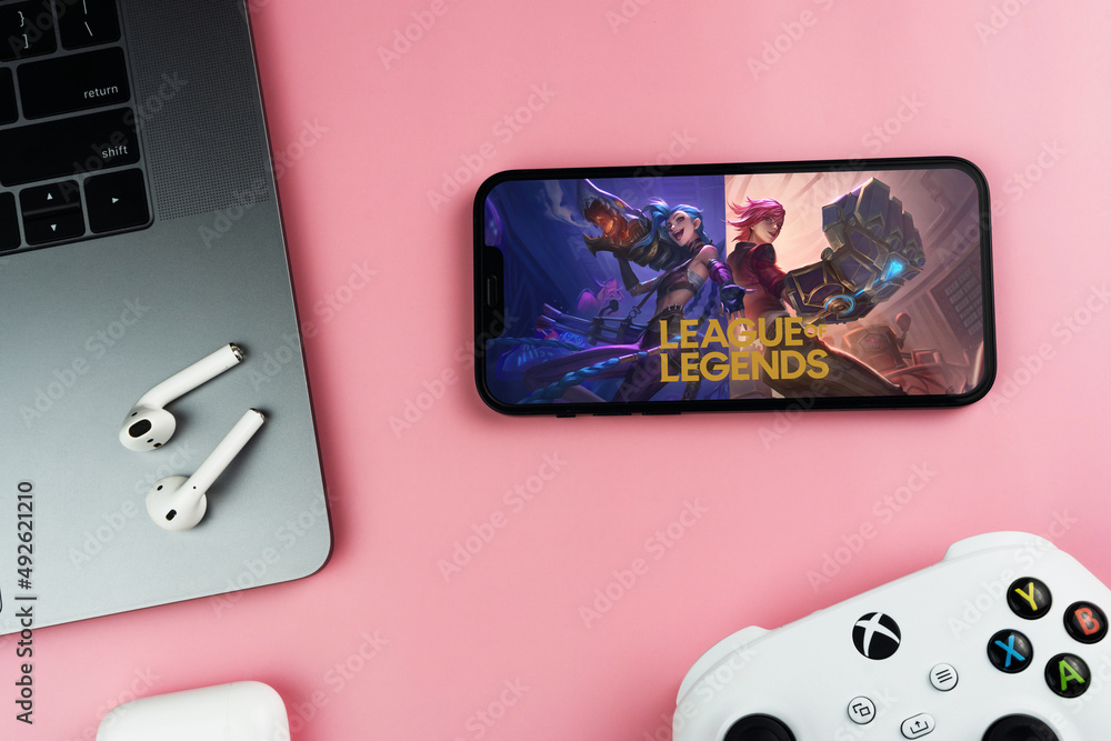 League of Legends (LOL) mobile game app on the smartphone screen. Pink ...