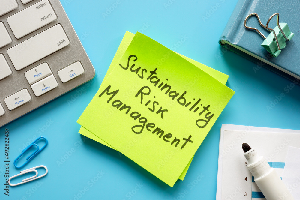 Sustainability risk management sign on the green memo and report. Stock ...