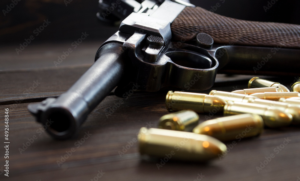 Historic Luger P08 Parabellum handgun, old soviet TT handgun and shiny ...