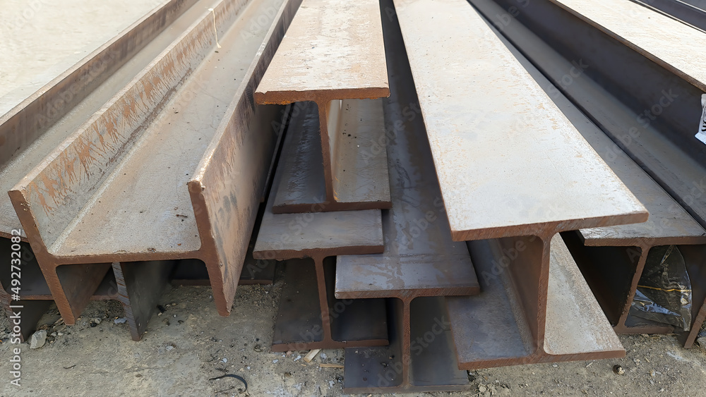 H beam or I beam made of heavy duty metal on ground. metal work ...