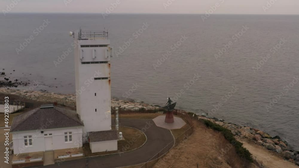 An aerial view of the statue by the Montauck lighthouse in NY, built as ...
