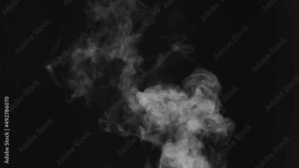 Boiling Water Evaporation Flow. A stream of white steam, slowly ...