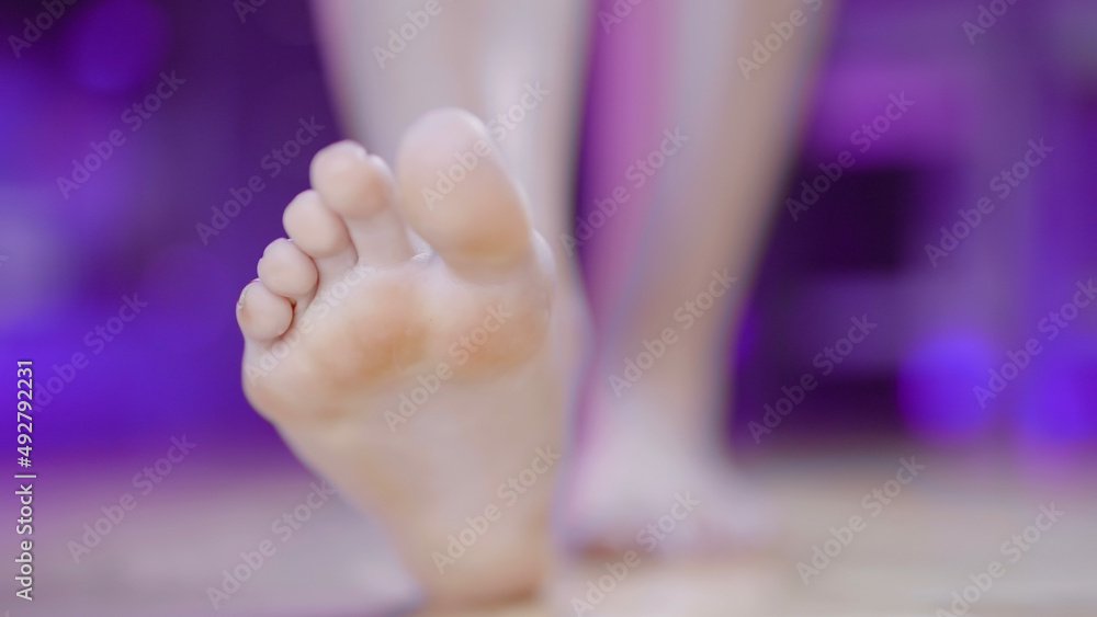 Female foot step on forward with sole and toes in focus Stock Photo ...