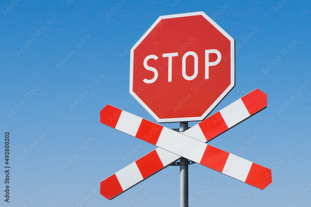 Stop sign background. Long railway landscape. Road sign suggesting ...