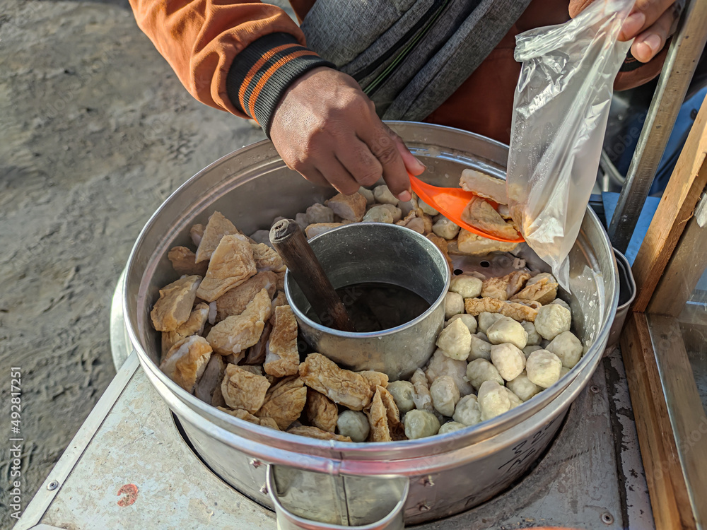 Indonesian street food named "Cilok". Made of tapioca flour, tofu and ...