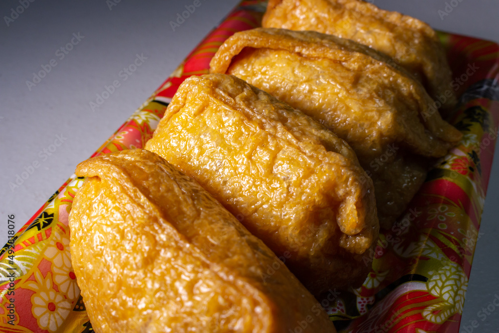 Closeup takeout Inarizushi (Inari sushi or fox sushi), a type of Sushi ...