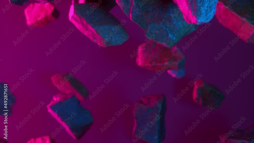 Rocks set on neon pink blue background. Fly rocks pieces background ...