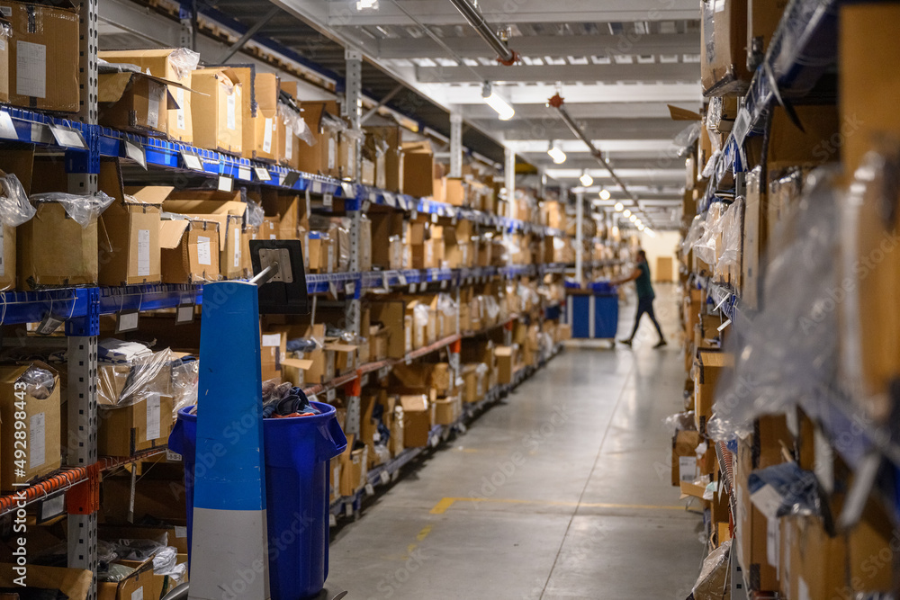 Busy ECommerce Warehouse Distribution Facility Stock Photo | Adobe Stock