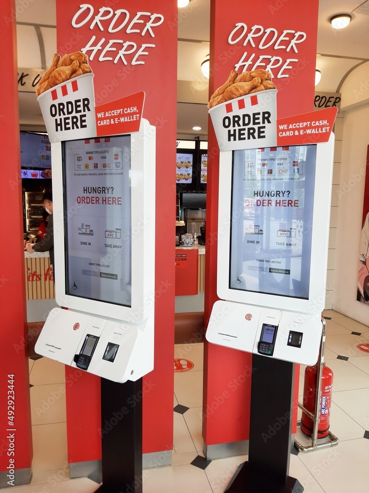 Kentucky Fried Chicken self order counter at the shop. Help to reduce ...