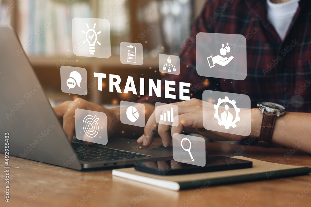 Person working on computer with icons of Trainee program and ...