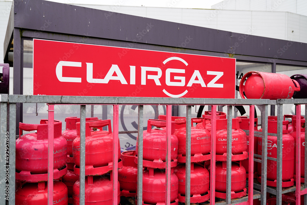 clairgaz logo brand and text sign on gas bottle storage cage in shop ...