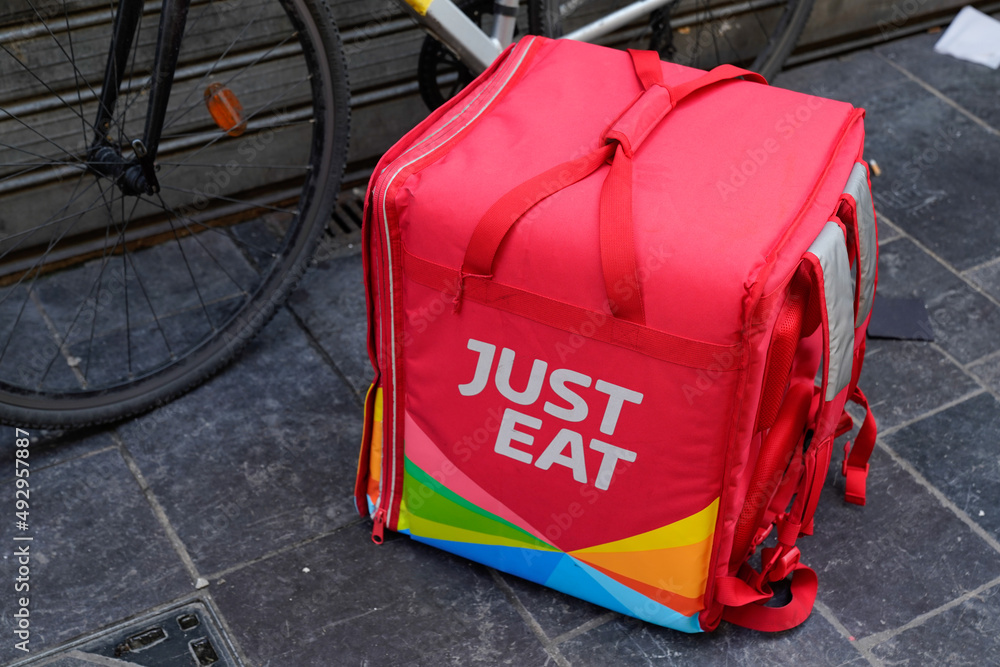 Just Eat sign text and logo brand of food restaurant home delivery ...