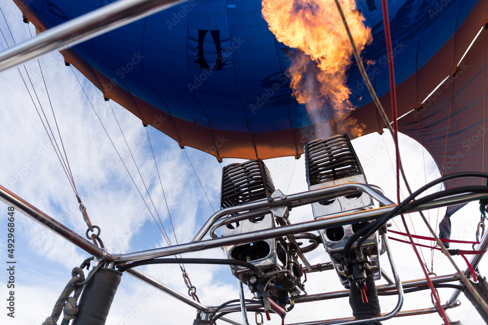 Hot air balloon gas burner. Getting the air ballon ready for the flight ...