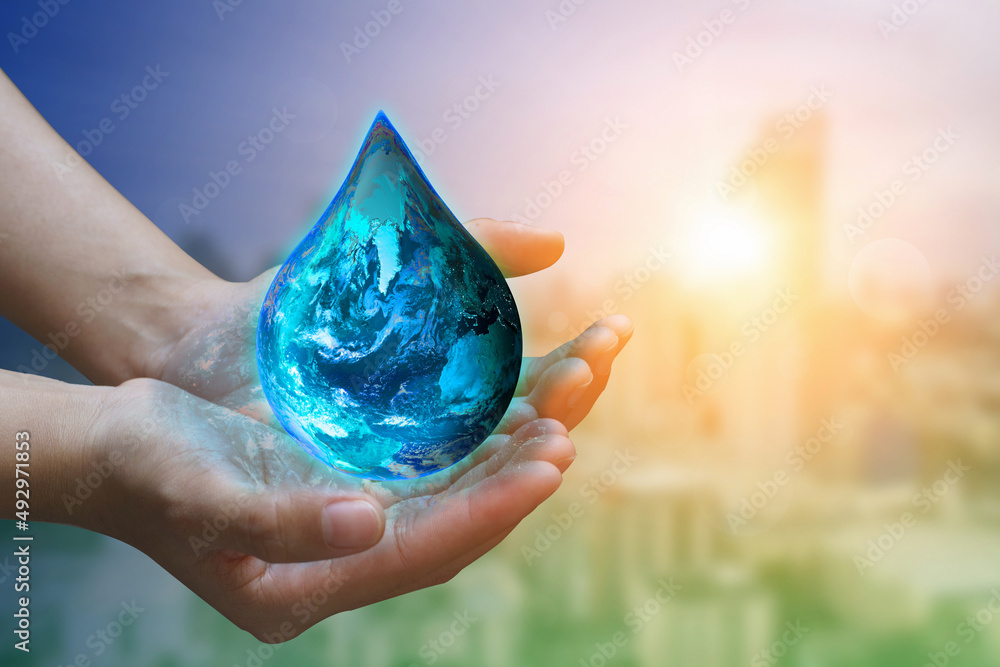 Earth fuel drop was holding in human hands. World environment day and ...