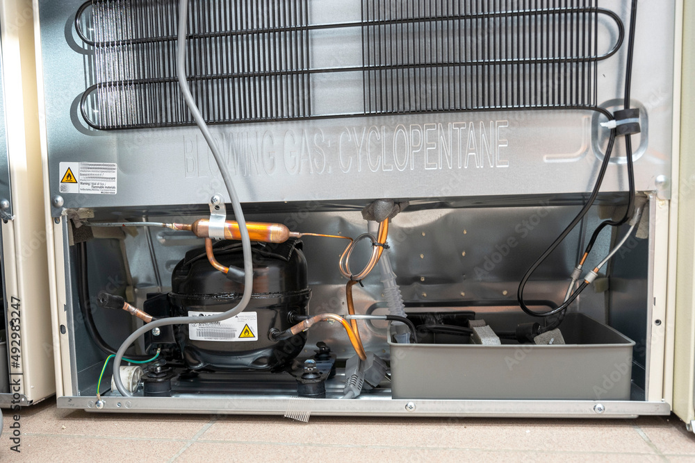 rear view of a household home refrigerator, refrigerator unit ...