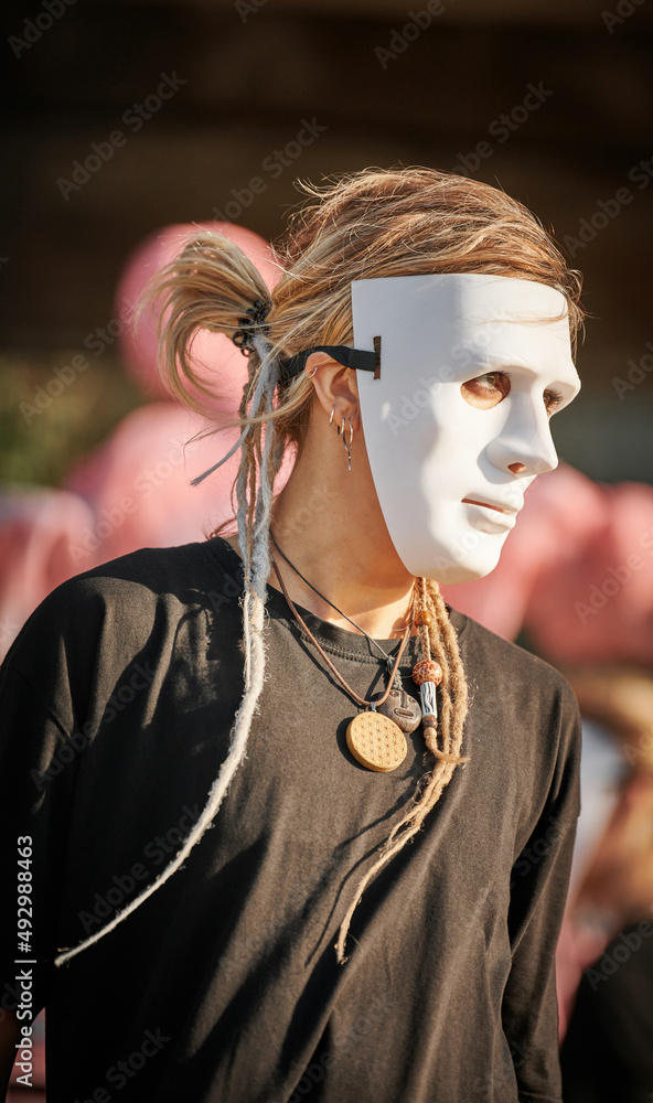 Woman acting in stage role in theater mask making smooth movements ...