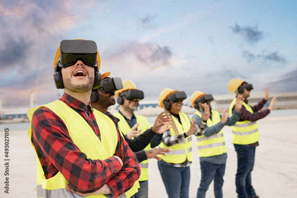 group of workers in a port with virtual reality goggles digital ...