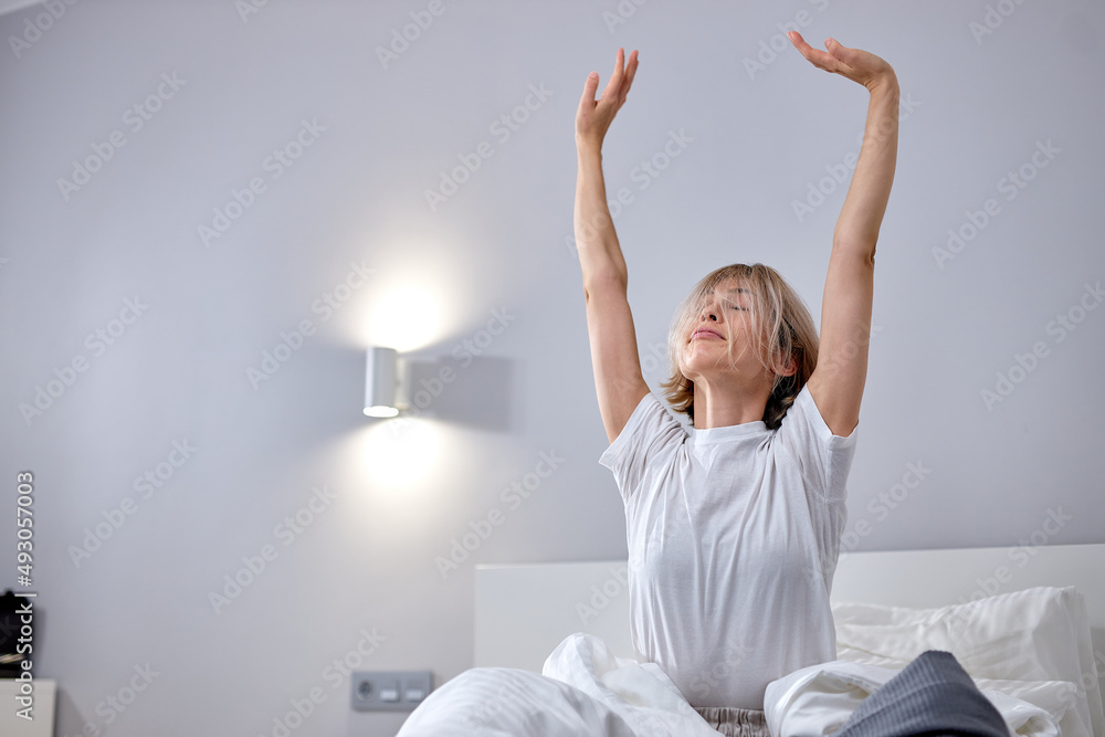 Good morning. Playful pretty young caucasian woman with short hair ...