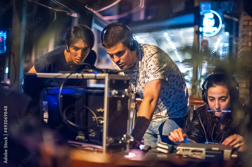 Behind scenes. Film and sound director control filming from studio ...