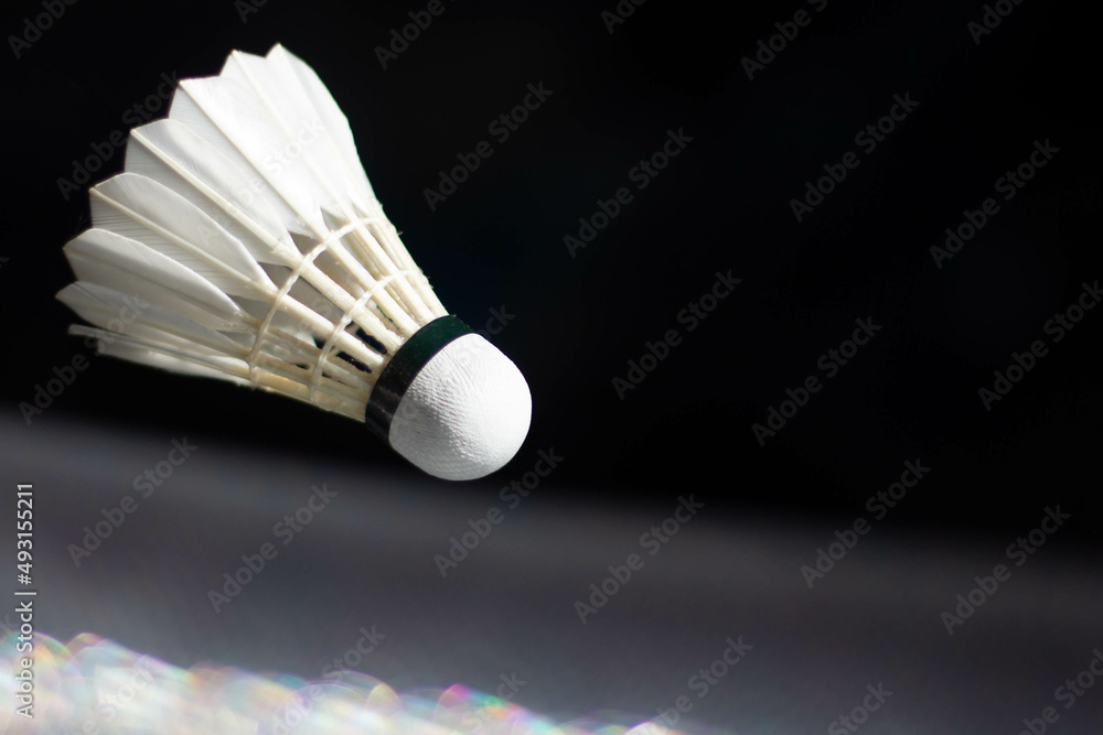 badminton ball floating in black background badminton ball used in ...