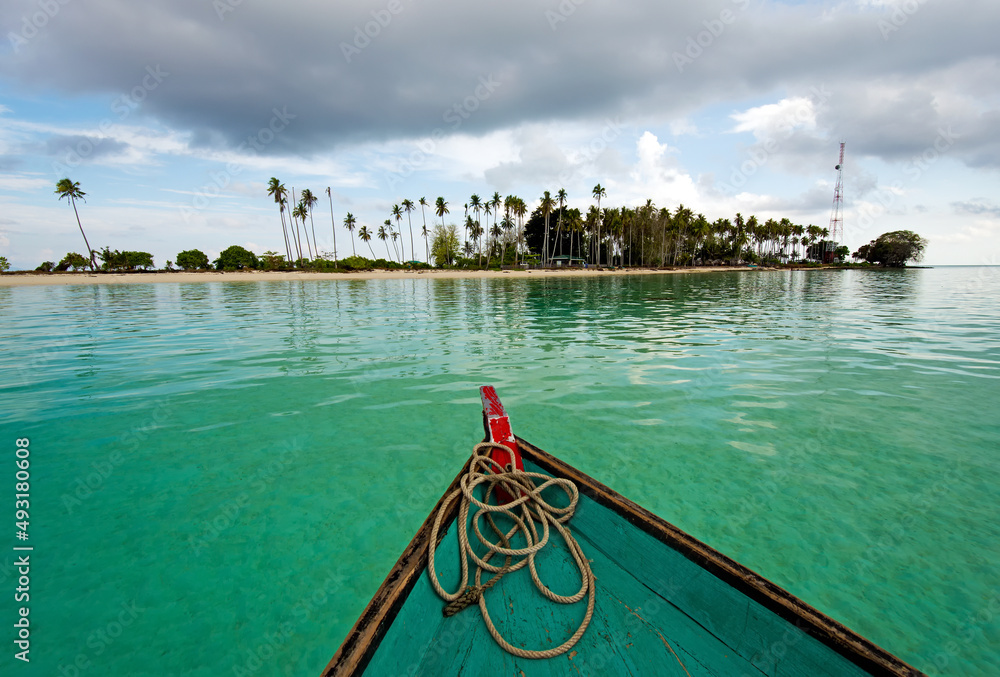 Boat heading toward Sibuan Island located in Semporna in the vicinity ...