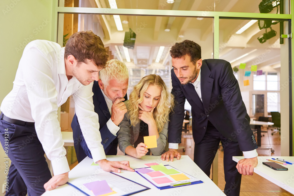Business people plan a project together Stock Photo | Adobe Stock