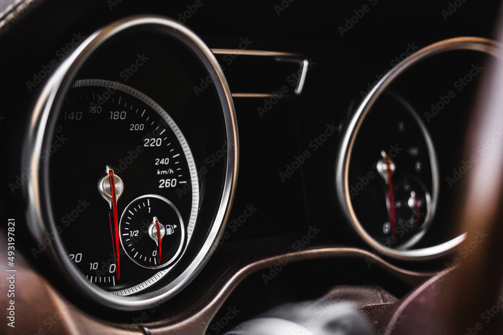 Speedometer at dashboard of luxury sport car, close-up view, vehicle ...