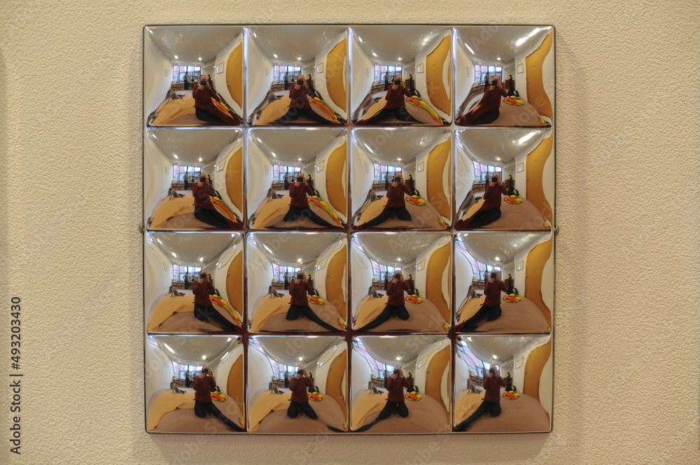 Virtual images reflected in diverging mirror, spherical mirror creating ...