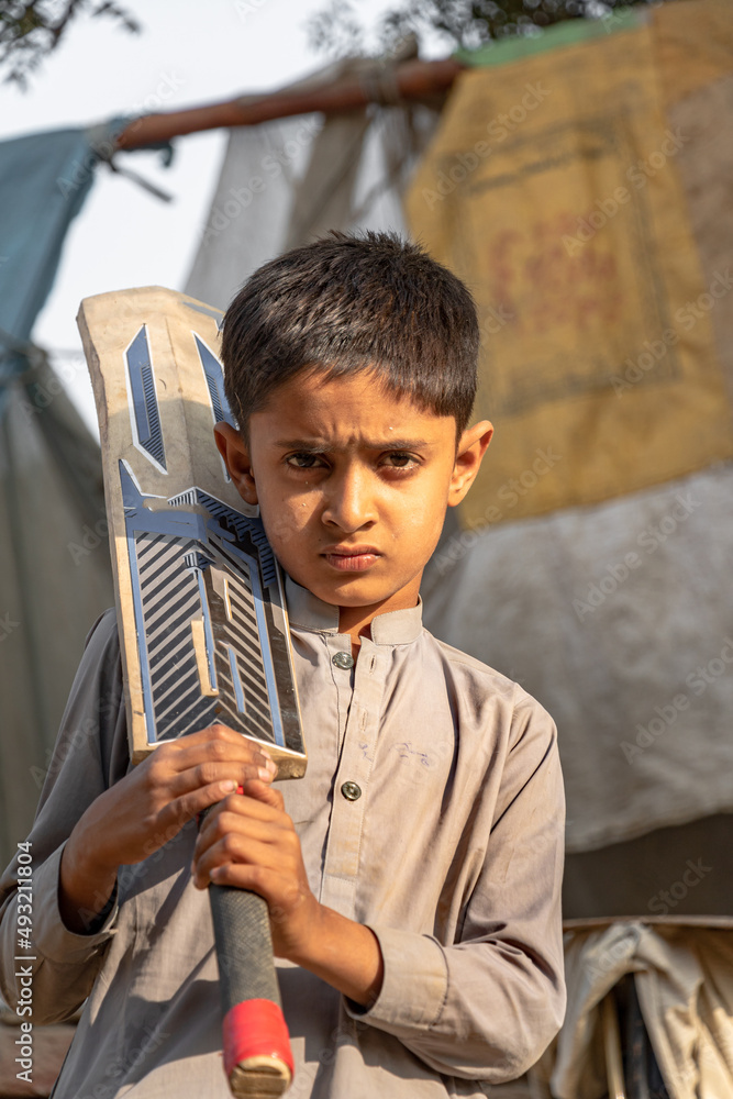 poor by playing it the park with sad face expressions Stock Photo ...