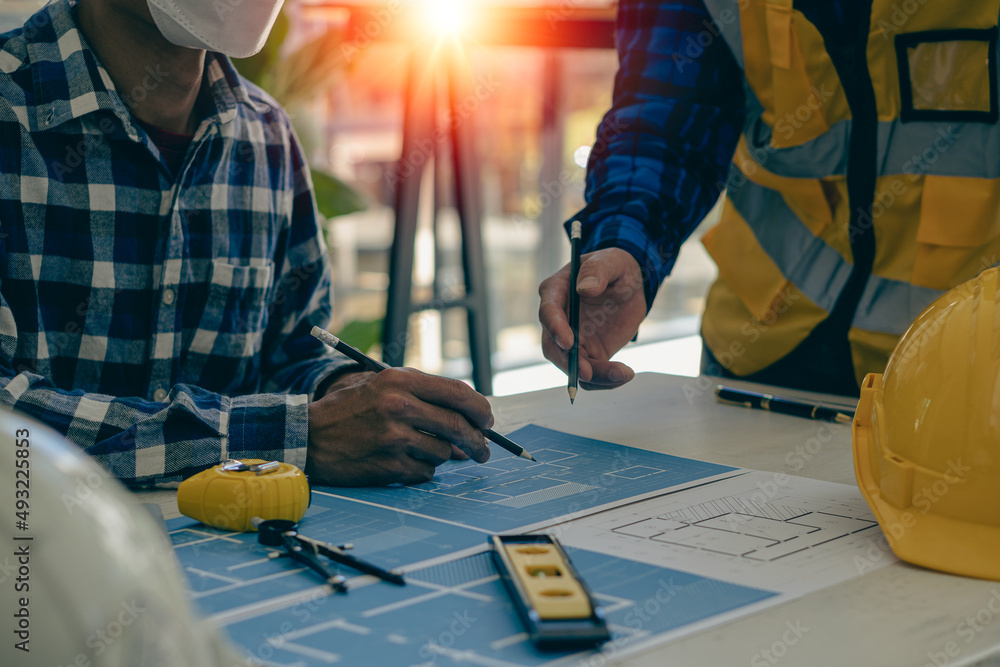 2 construction site engineers On-site engineering objects work with ...