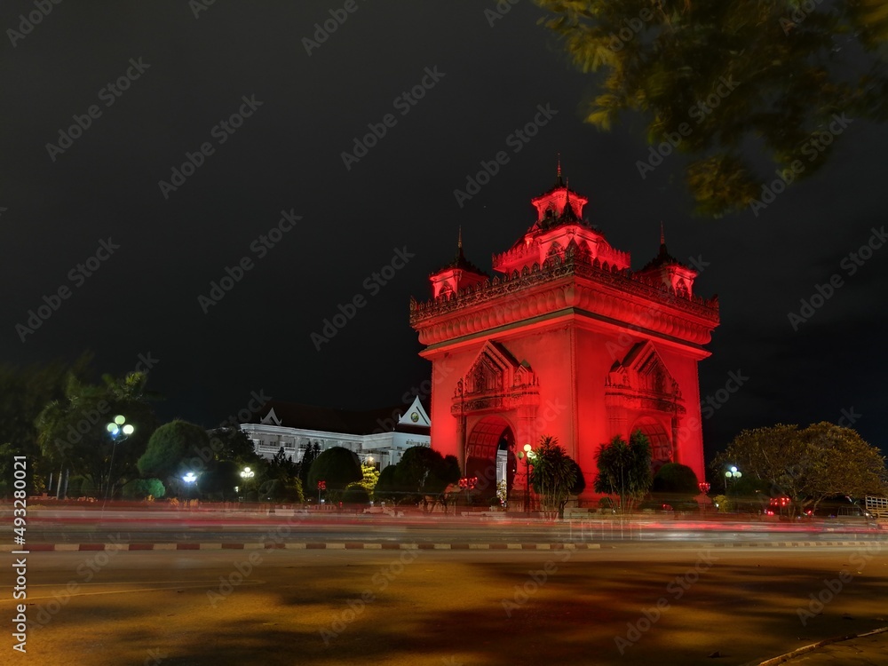 Patuxay Monument at night time with red light color in Vientiane, Laos ...