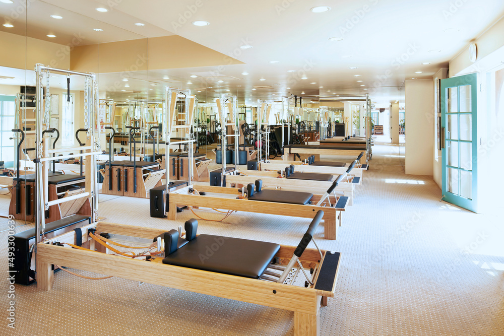 Pilates studio with pilates exercise equipment Stock Photo | Adobe Stock