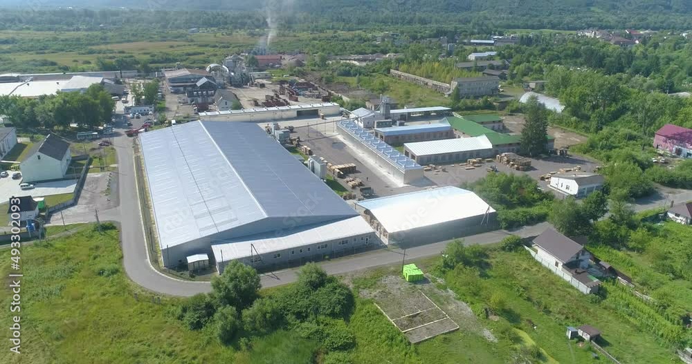 Modern factory top view. A flight over a new modern furniture factory ...